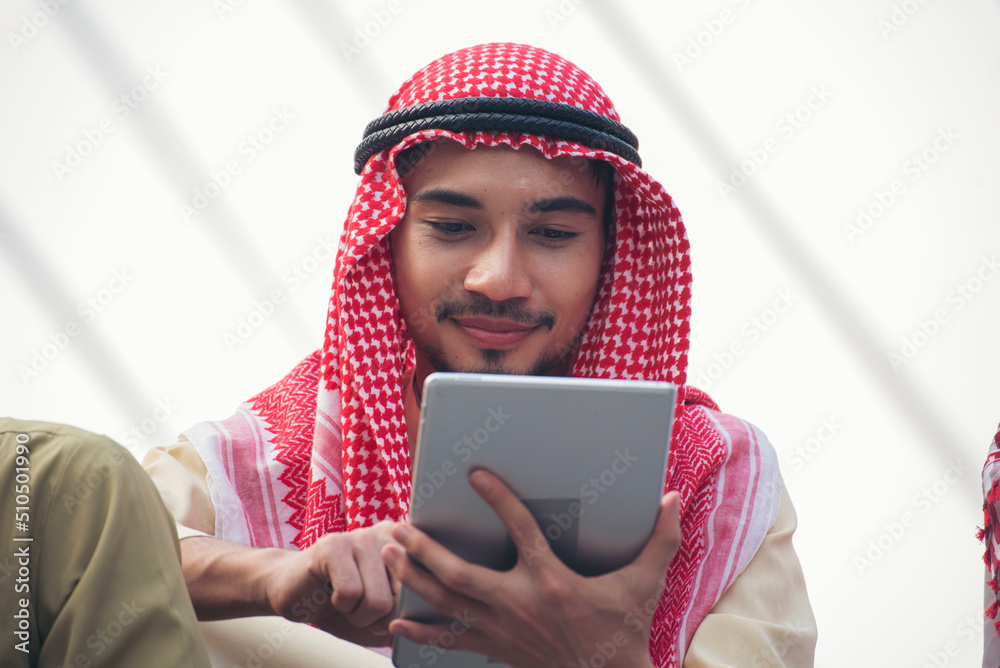 Islamic man using smartphones app organize schedule agenda focus on ...