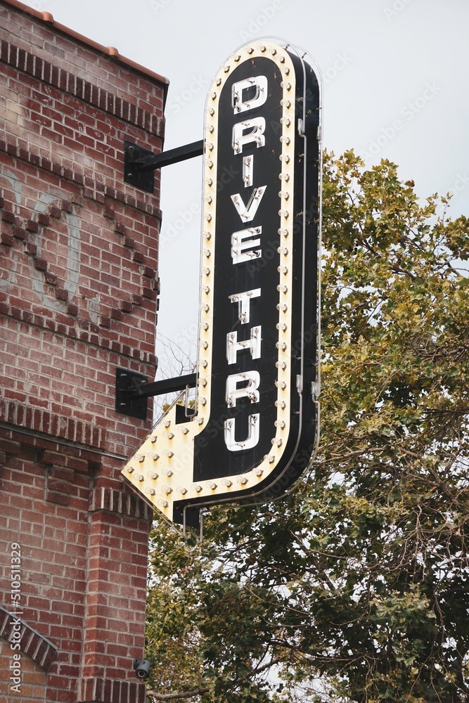 Aged and worn vintage neon drive-thru sign arrow Stock Photo | Adobe Stock