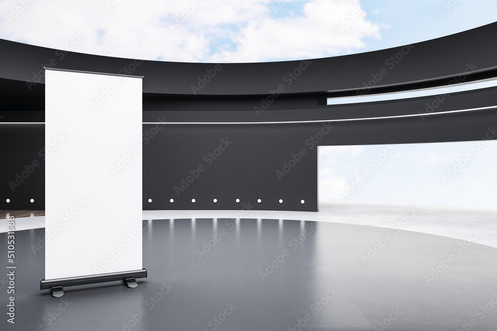 Open ceiling with sky view gallery interior with empty white roll up ...