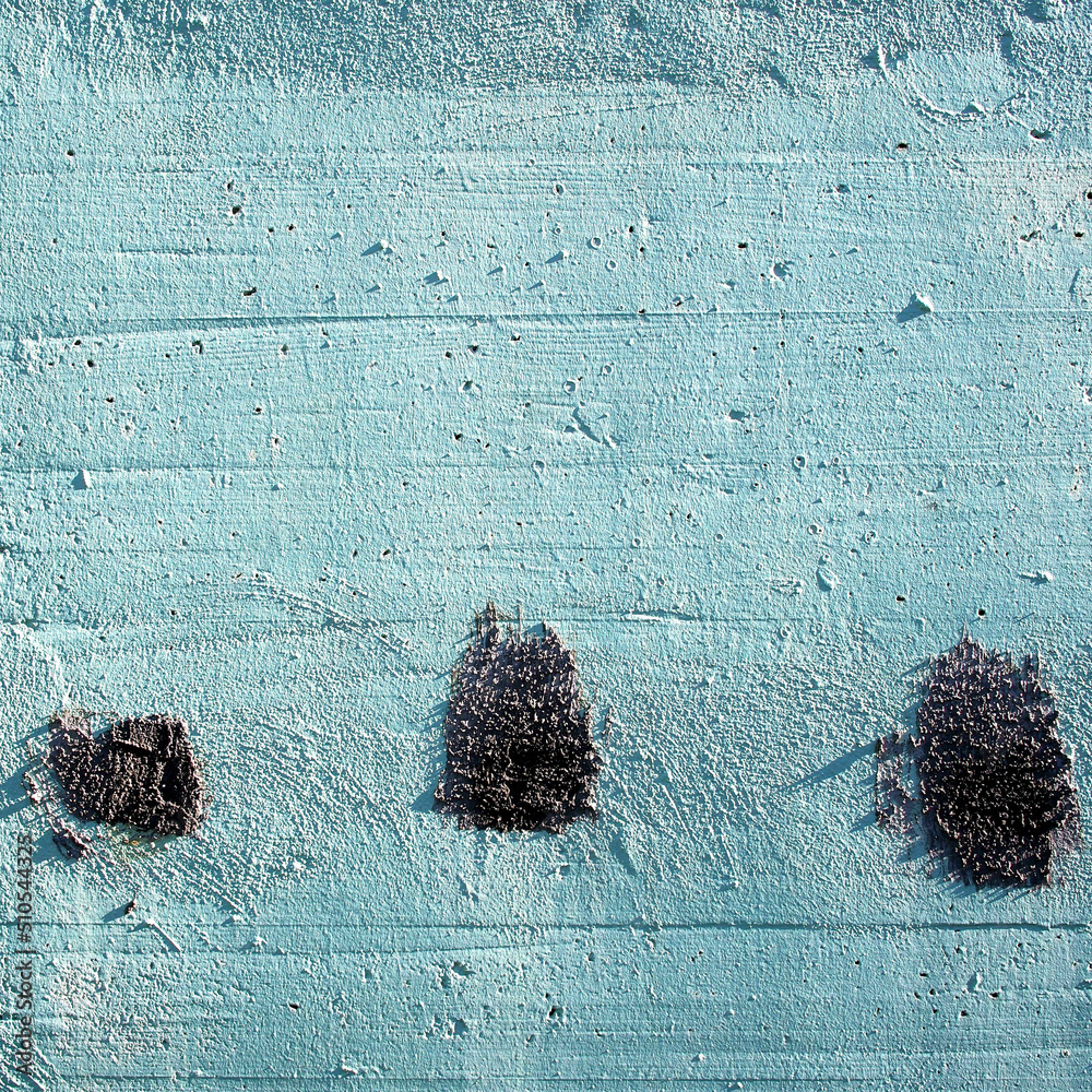 Pared de cemento color azul con pegotes de cemento. Formato cuadrado ...