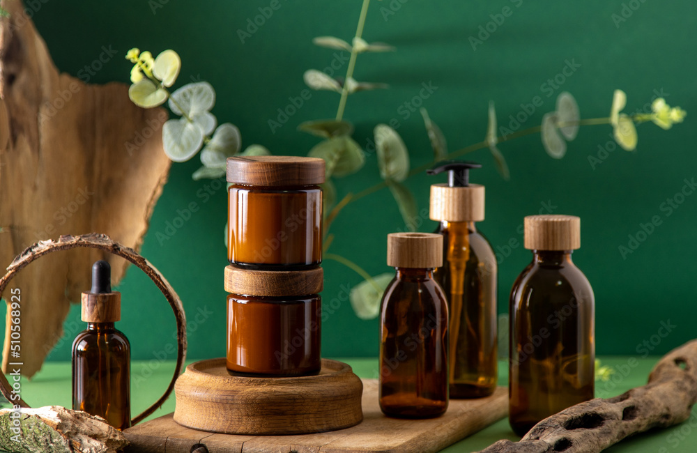 Glass brown containers for cosmetics with wooden lids. Cream jar ...