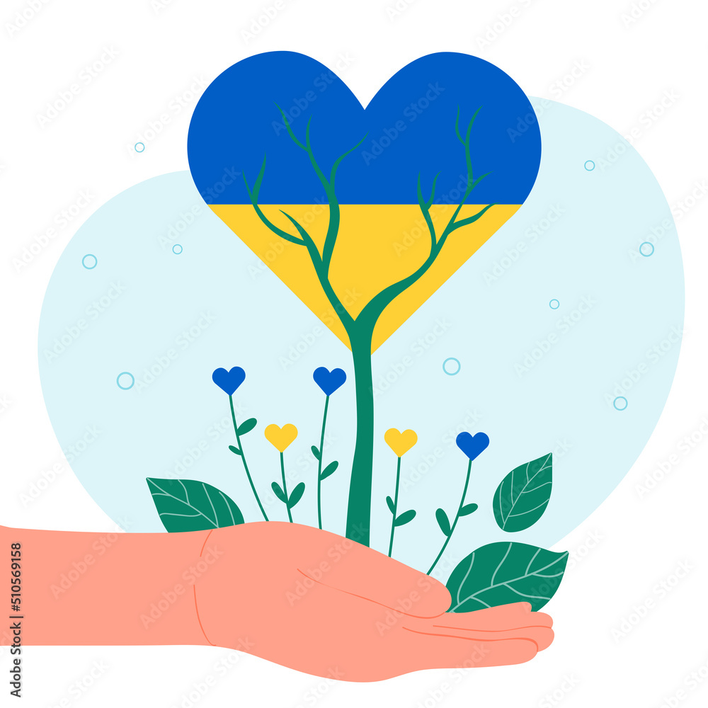 Hand of volunteer holding growing plant with yellow and blue heart ...