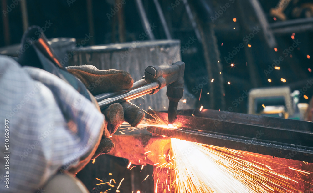 Blur Close up hand heavy industrial worker is working on metal work ...