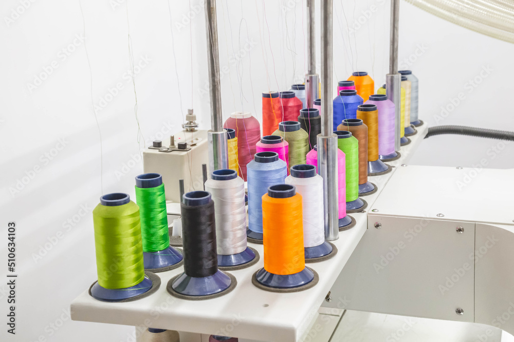 Embroidery threads. The embroidery machine is engaged in embroidery ...