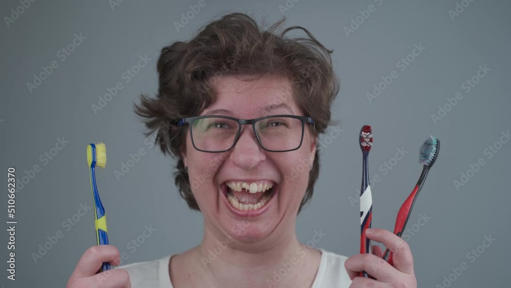 Toothless funny woman. Cute female smiling extensively with toothbrush ...