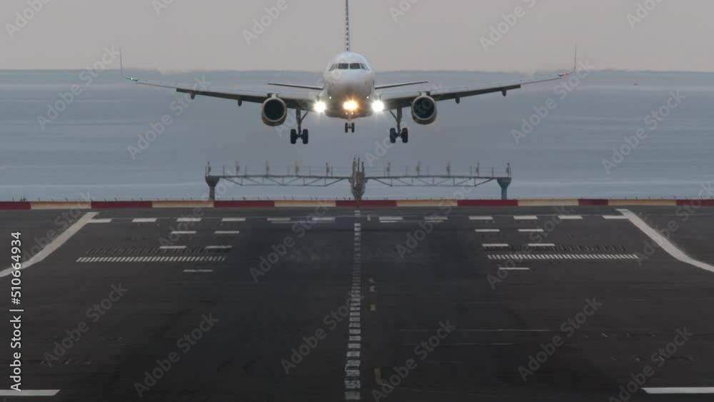Airplane coming in to land Stock Video | Adobe Stock
