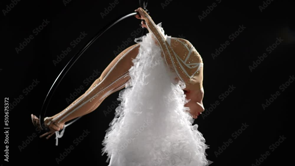 Smiling skilled confident woman performing reverse figurehead on air ...