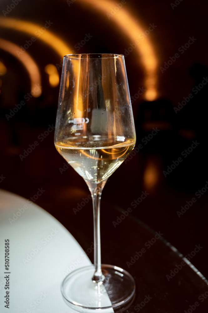 Tasting of brut champagne sparkling wine produced by traditional method ...