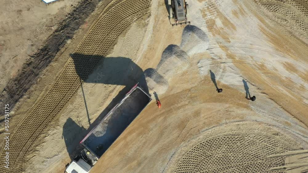 Above top view, overhead on tipper truck as lifting his trailer to ...