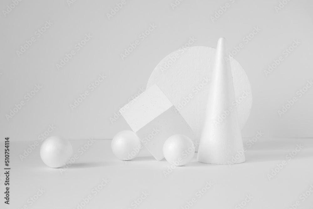 Monochrome composition of various 3d geometric shapes. White balls of ...