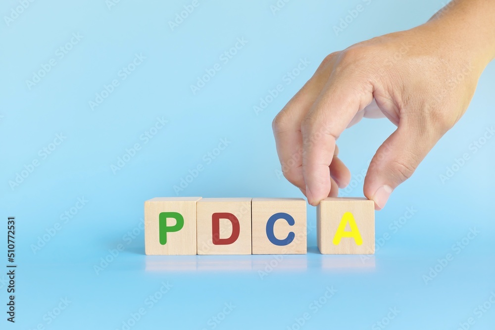 PDCA or Plan Do Check Act cycle method concept. Hand putting action ...