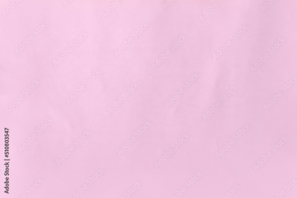 Pale sweet candy plain pink color on recyclable creased blank paper ...