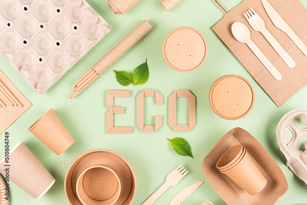 Paper utensils and wooden bamboo cutlery set with text ECO made with ...