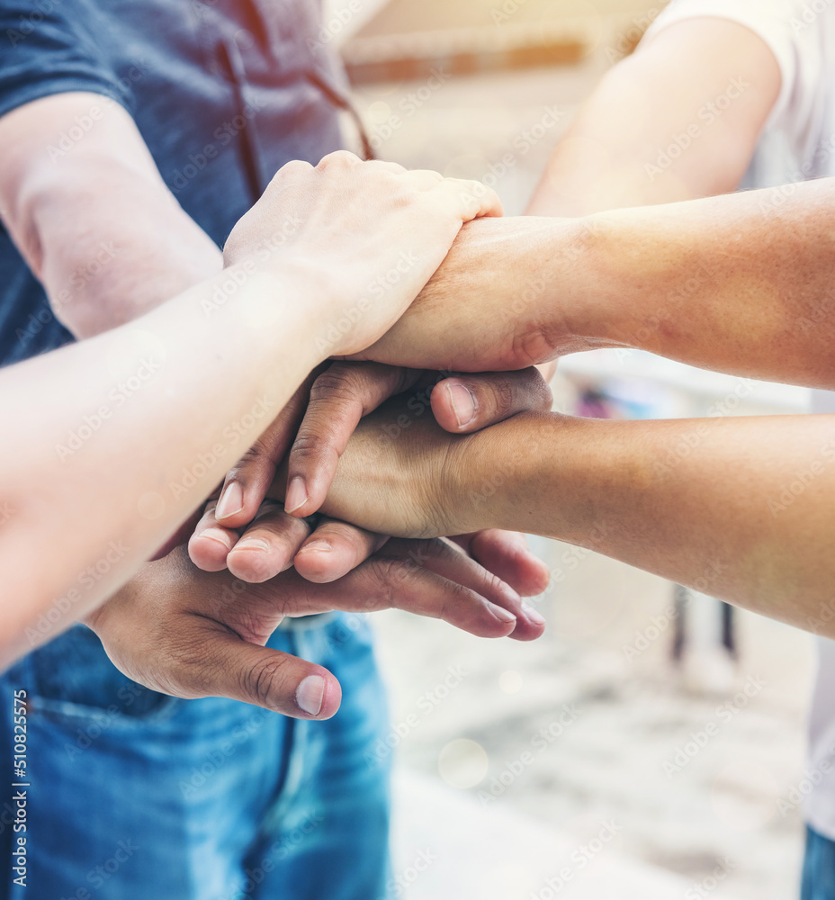 Together collaborate of hands teamwork outdoor. Team Work charity ...