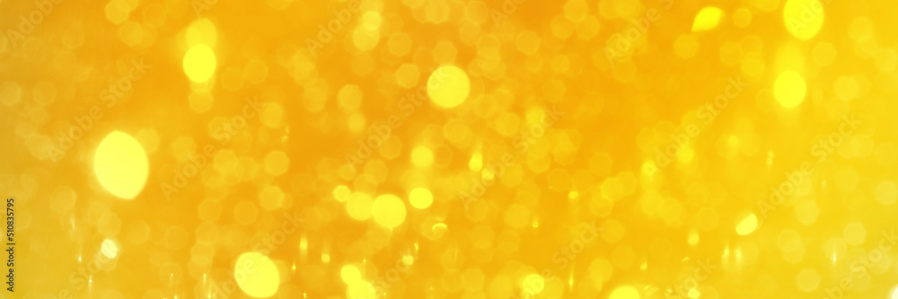 Bright yellow sparkling glitter bokeh background, banner texture ...