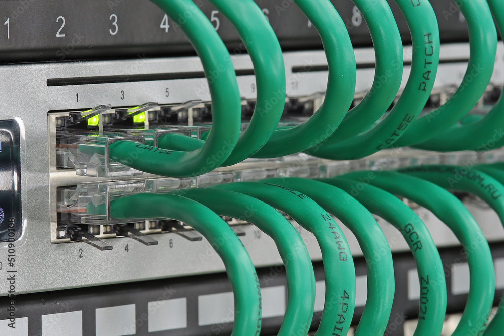 Connecting an Ethernet switch using patch cords with RJ45 connectors ...