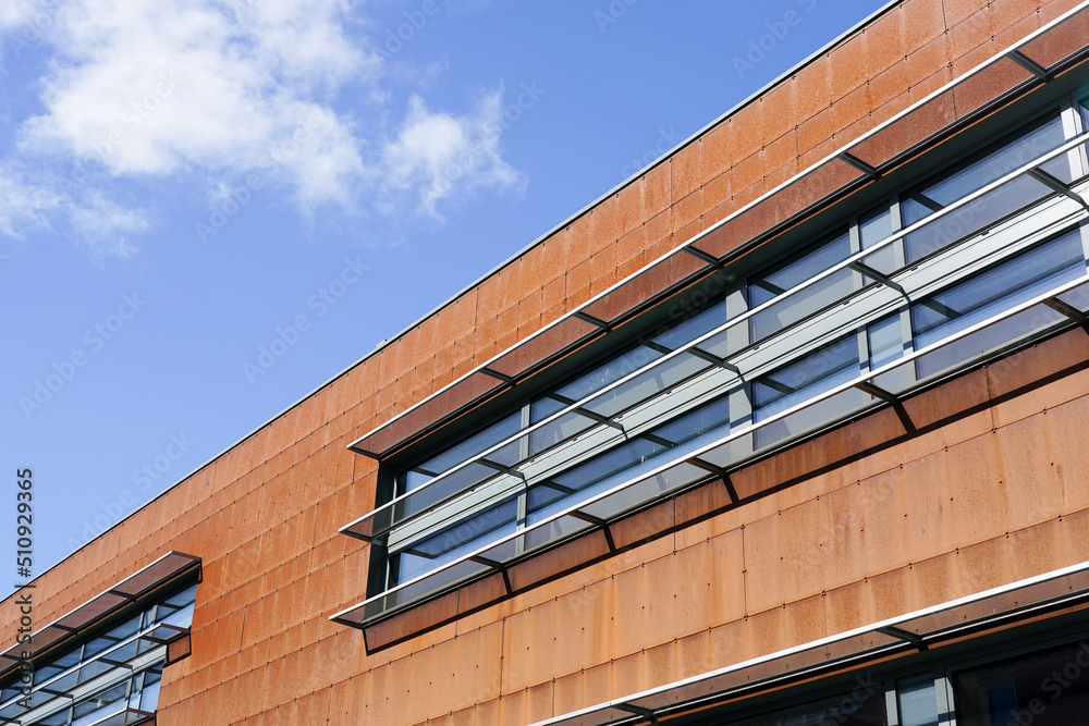 Rusted corten steel panels cladding facade of a modern design house ...