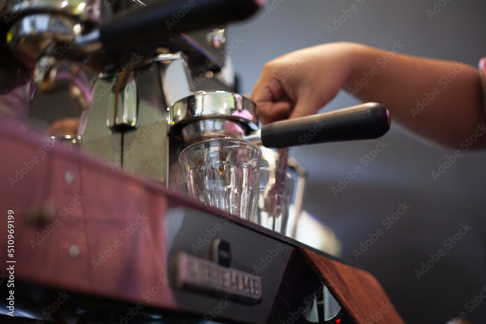 Coffee machine with clear glass under the portafilter ready to use to ...