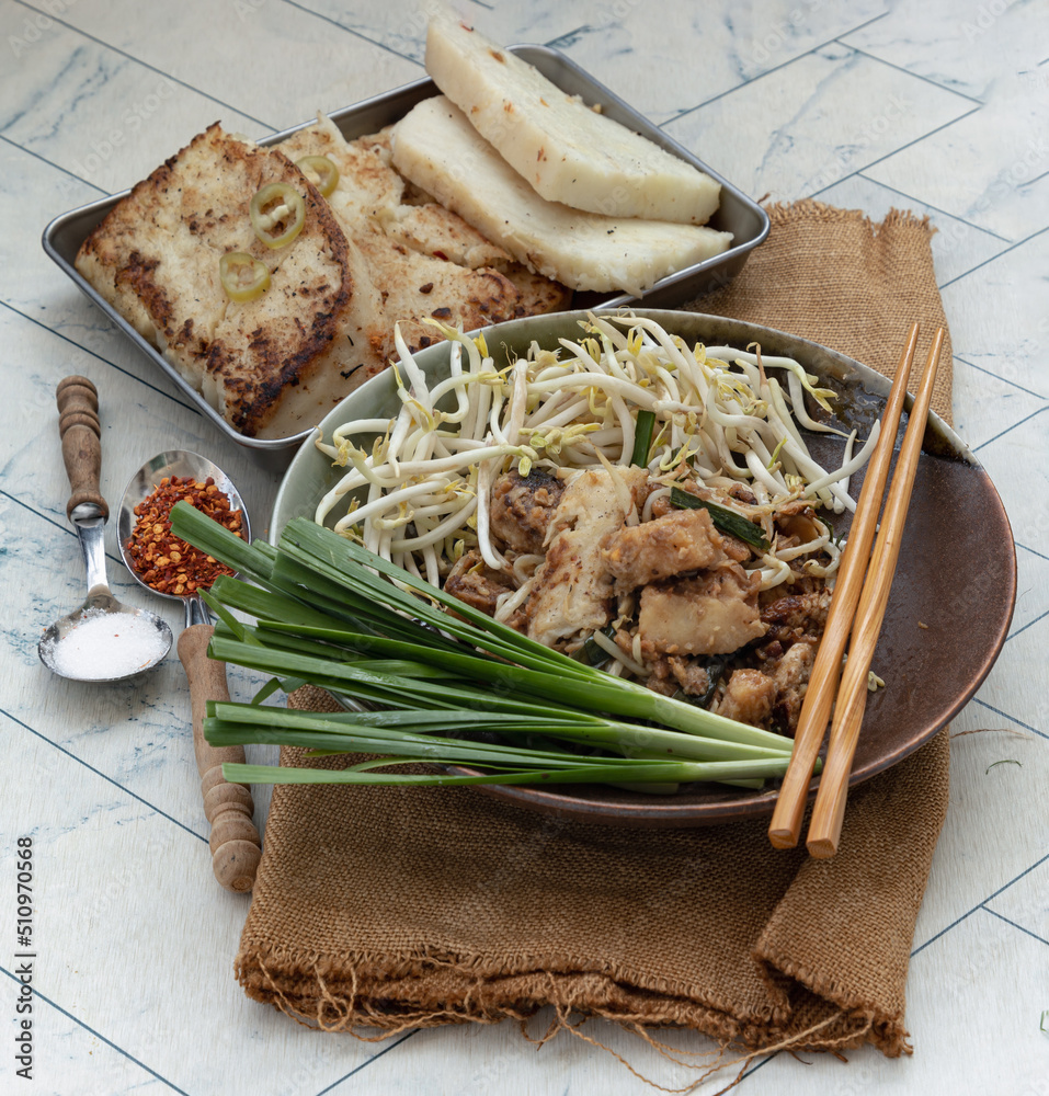 Stir fried soft turnip cake or Fried radish cake (chai tow kway) with ...