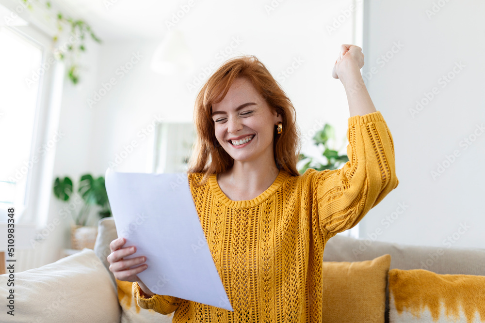 Excited young woman hold paper letter feel euphoric receiving job ...
