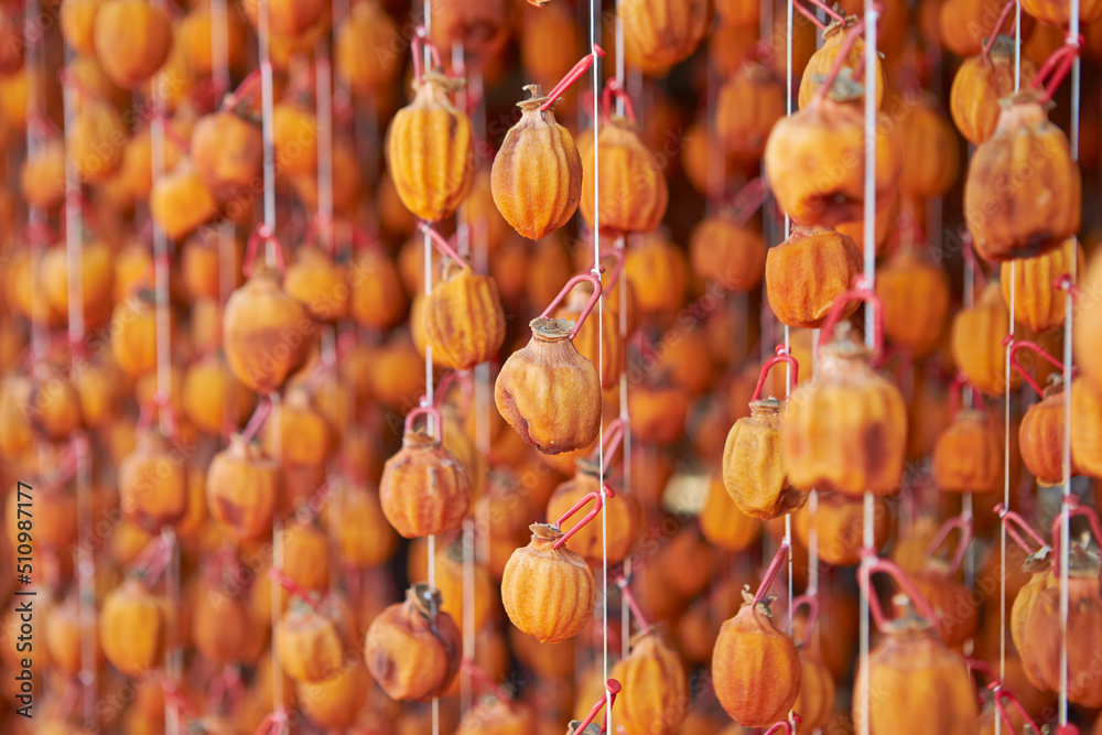 Dried persimmon in a traditional way Stock Photo | Adobe Stock