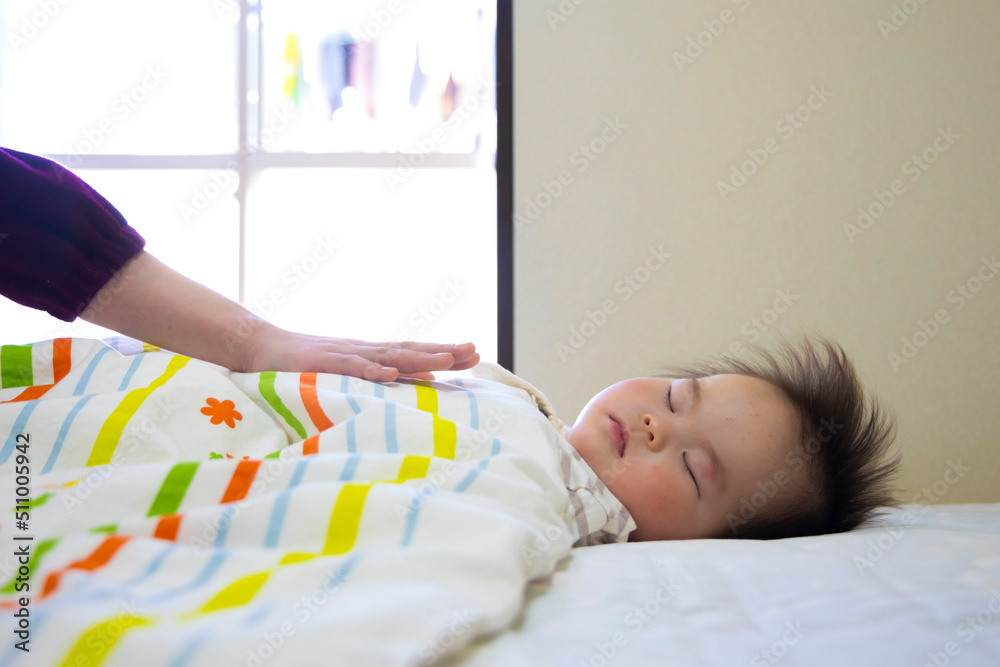 Baby taking a nap. Inside a house in Japan. Stock Photo | Adobe Stock
