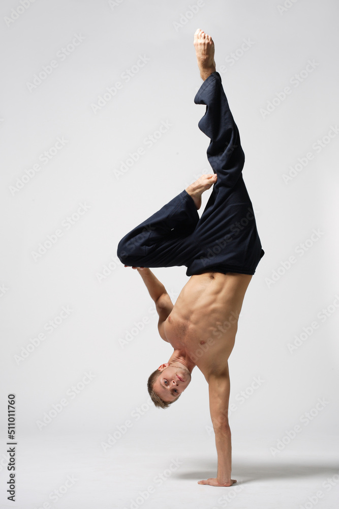 modern ballet male dancer posing over white studio background Stock ...