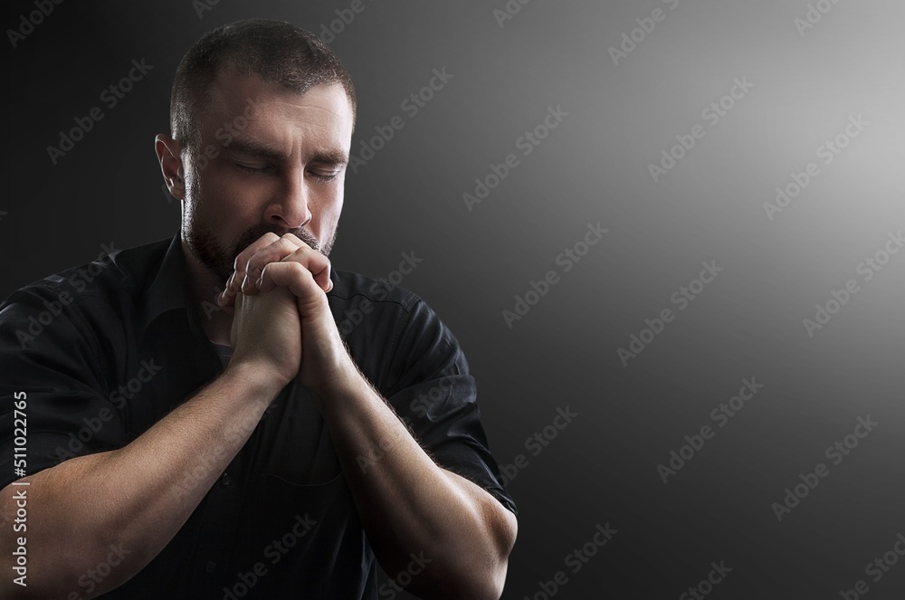 The boy folding his hands in prayer to god. prayer to God for happiness ...