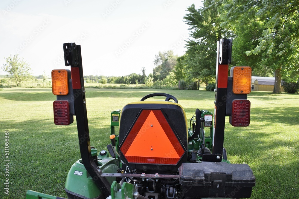 Caution Sign and Tail Lights on a Tractor Stock Photo | Adobe Stock