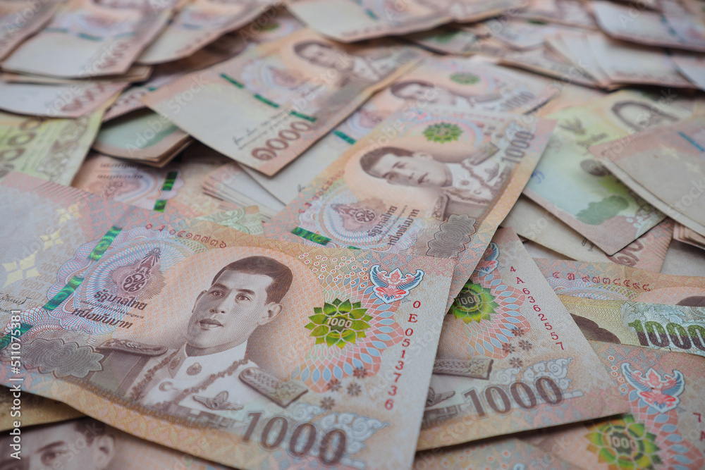Close-up a pile of one thousand Thai Baht (THB) banknotes of Thailand ...