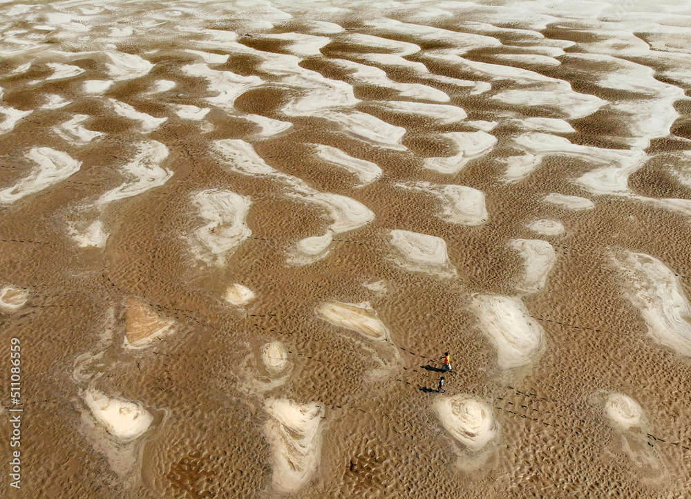 Huge sandbars arise in river Jamuna when the water level drops during ...