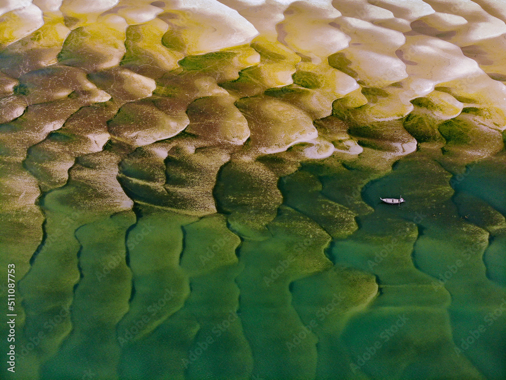 Huge sandbars arise in river Jamuna when the water level drops during ...