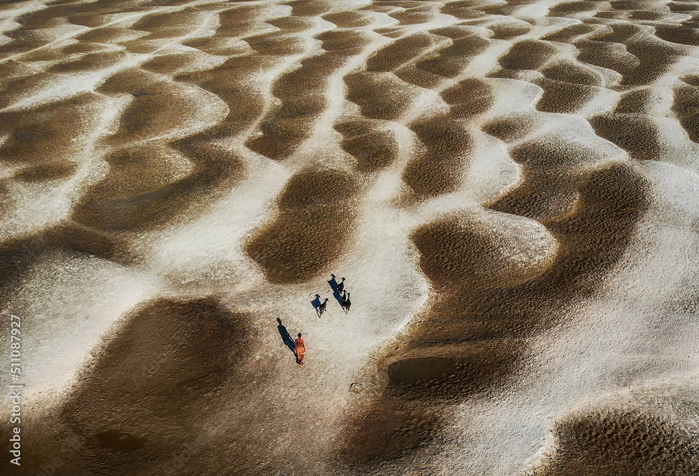 Huge sandbars arise in river Jamuna when the water level drops during ...