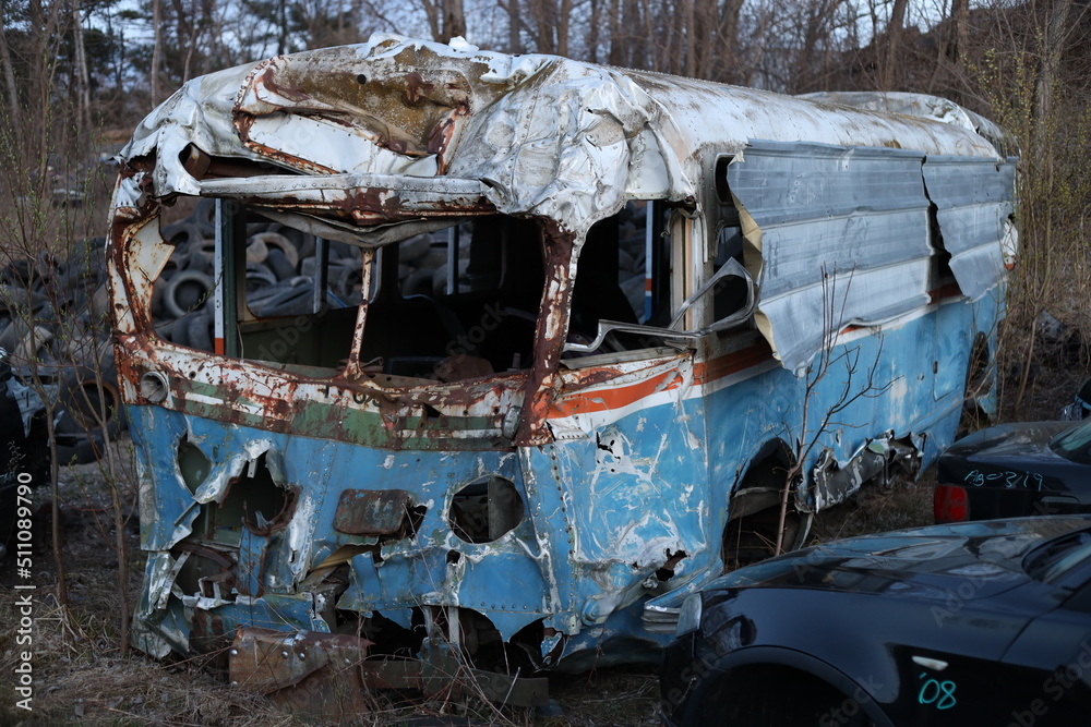 old decaying and eroded bus in the junkyard Stock Photo | Adobe Stock