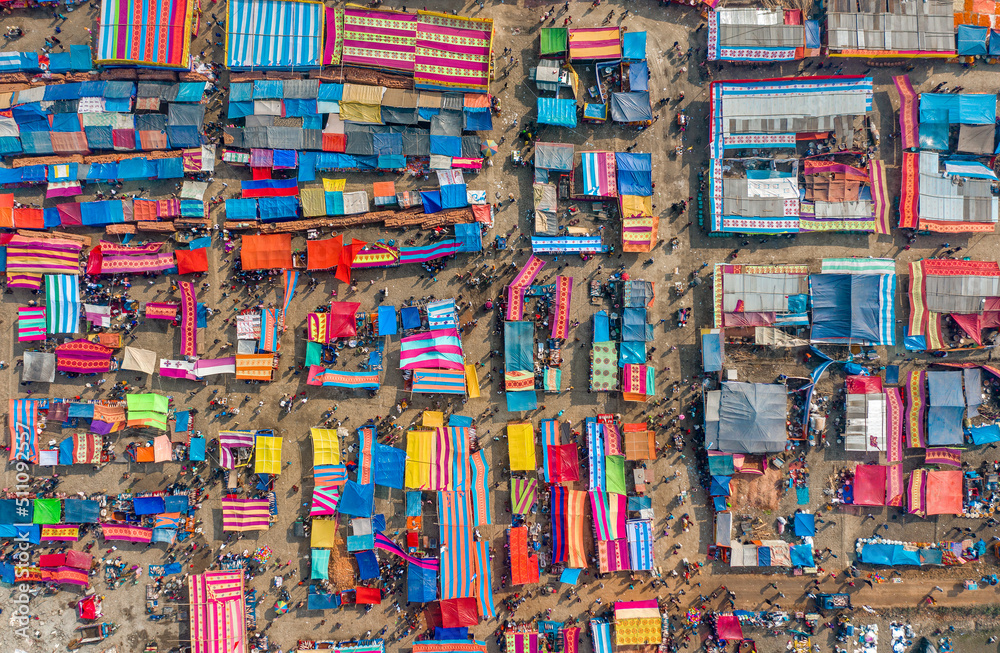 Aerial view of traditional village fair in Bangladesh. Colorful tents ...