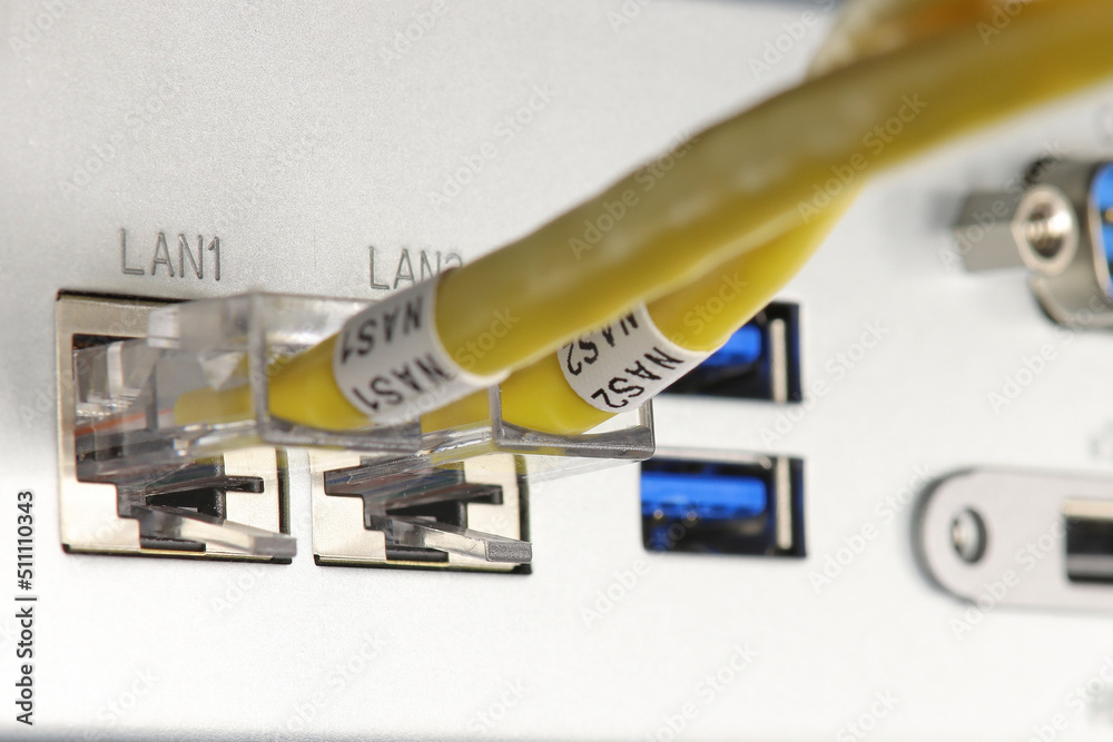 Connecting the RJ45 connector to the Ethernet socket of the switch in ...