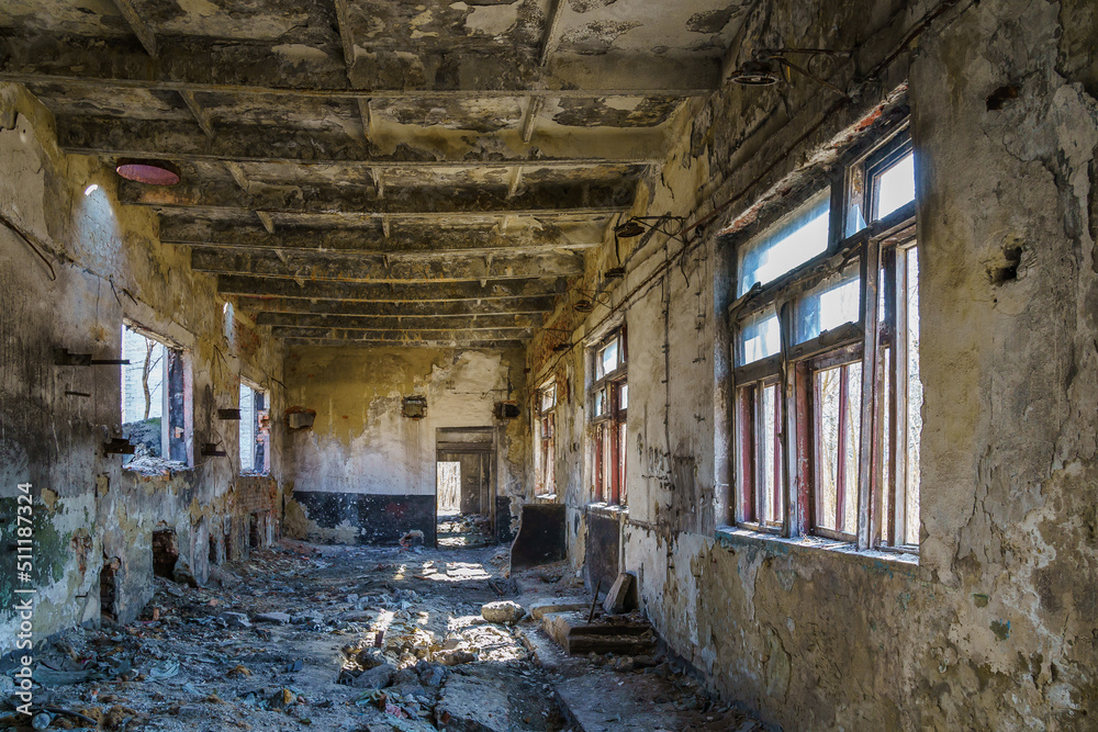 Destroyed and abandoned military barracks. Background with selective ...