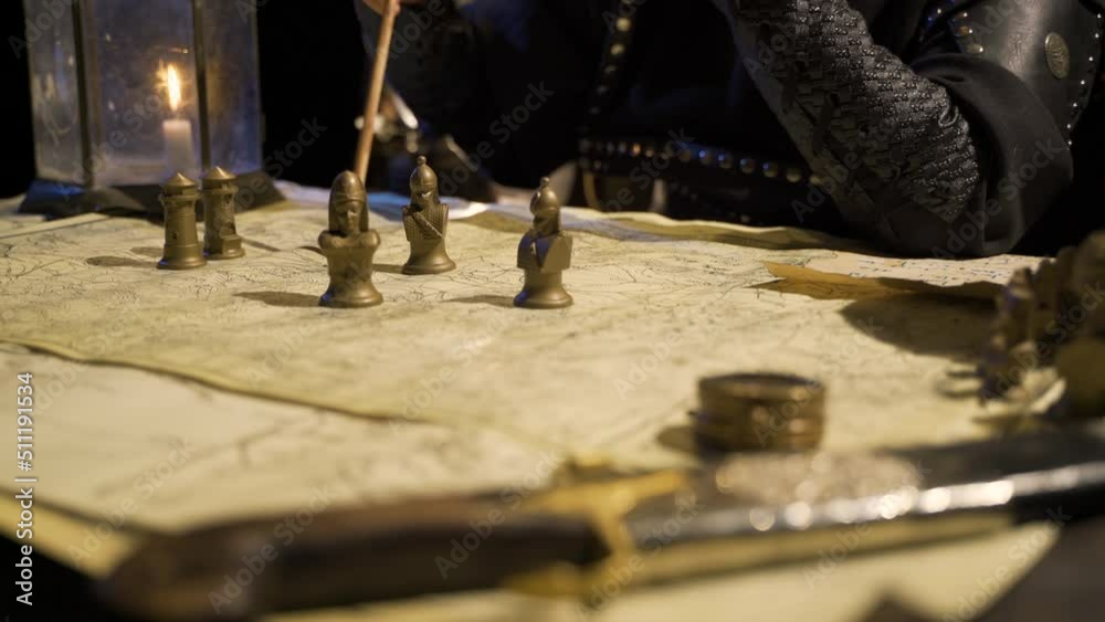 Commander working on the map. Historical warfare. The commander who ...