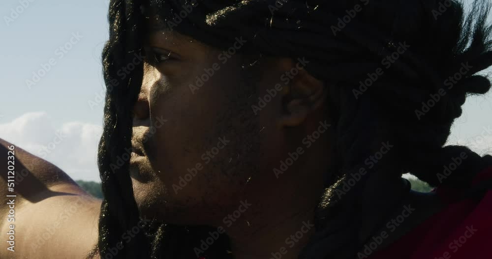 Samson with arms raised ready for confrontation while looking at ...