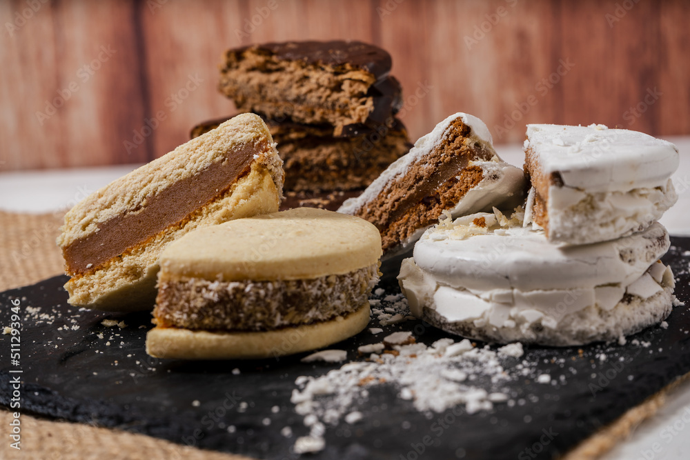 Three different types of the classic Argentinean alfajores filled with ...