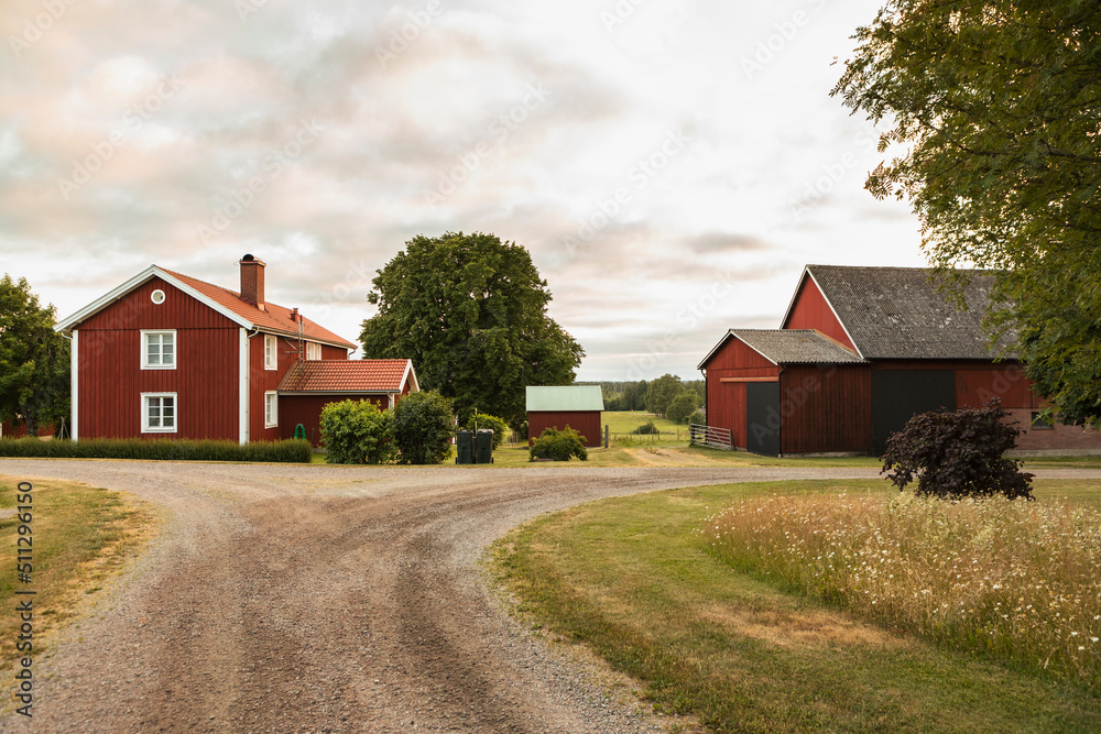 Falun red farm in rural landscape Stock Photo | Adobe Stock