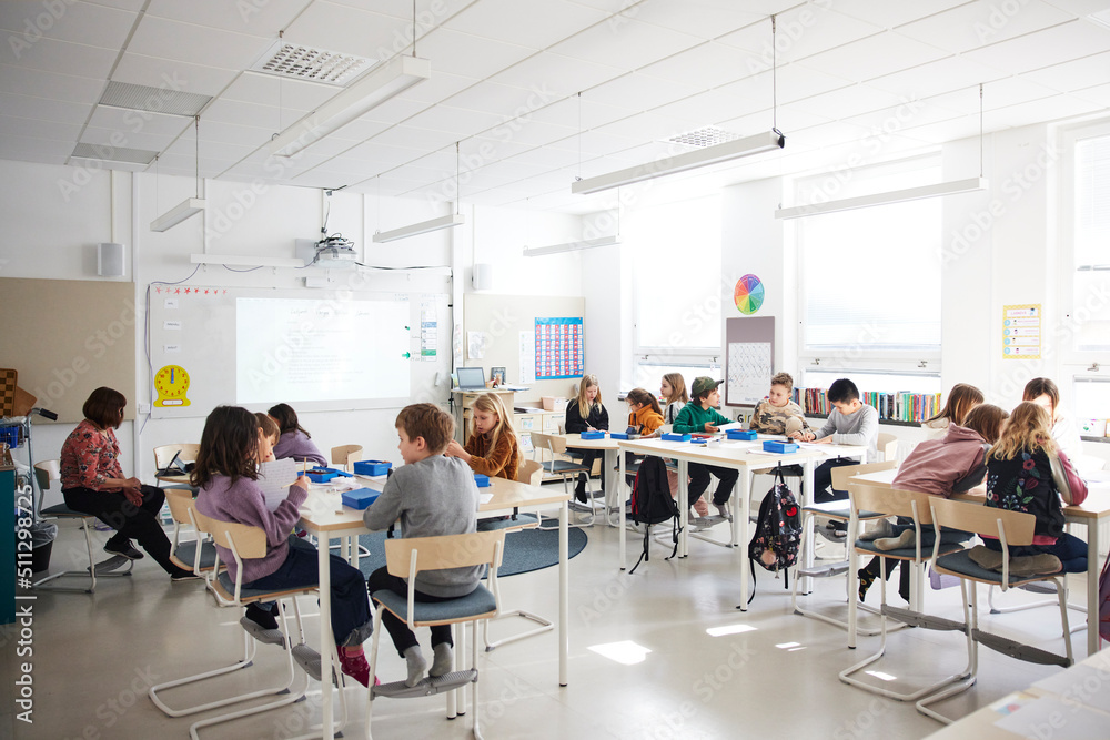 Students sitting in classroom Stock Photo | Adobe Stock