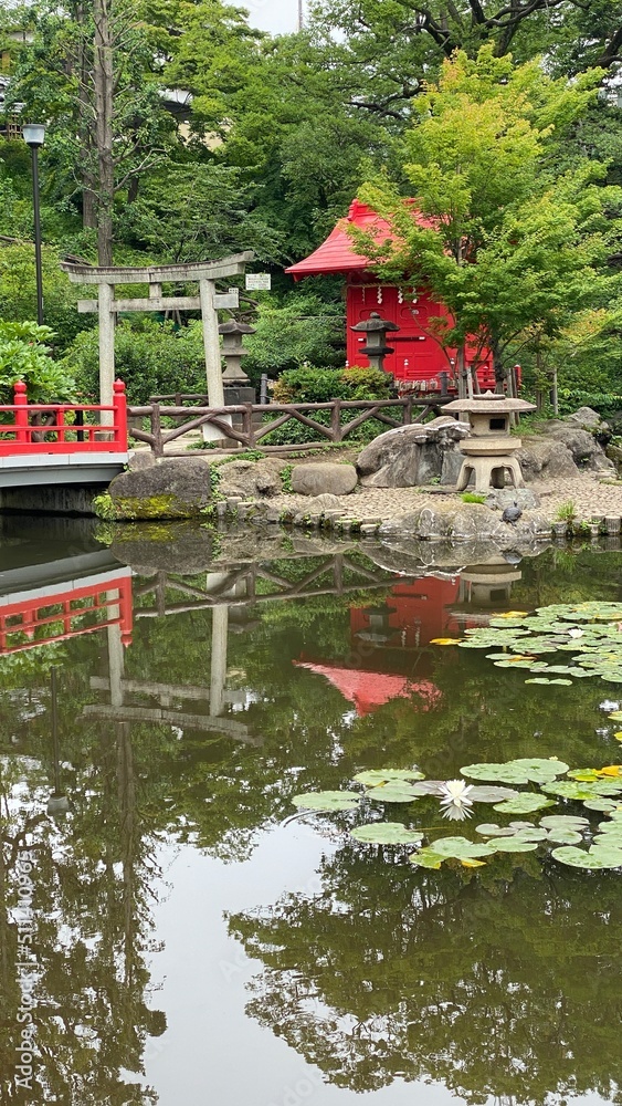 Cute little Japanese zen scenery, a park in downtown Tokyo “Sendagi ...