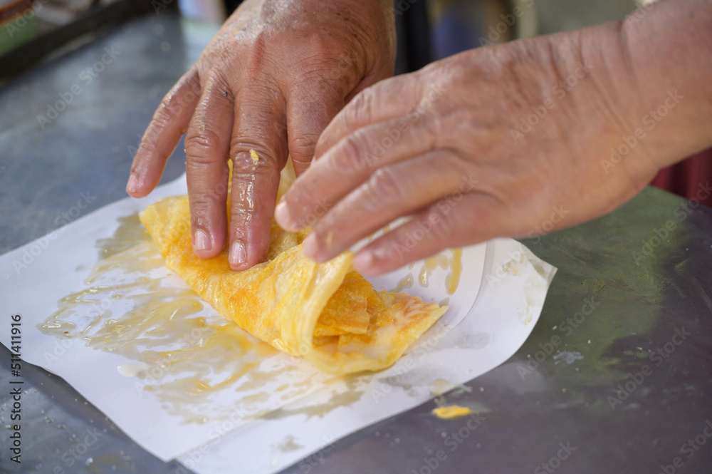 Roti Making, roti thresh flour by roti maker with oil. Indian ...