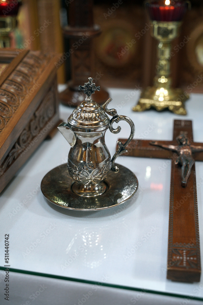 Church attributes on the throne. Wooden cross with the crucifixion of ...