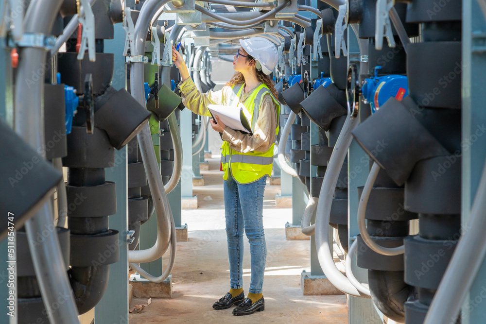 Engineer under checking the industry chilled water fan coil unit air ...