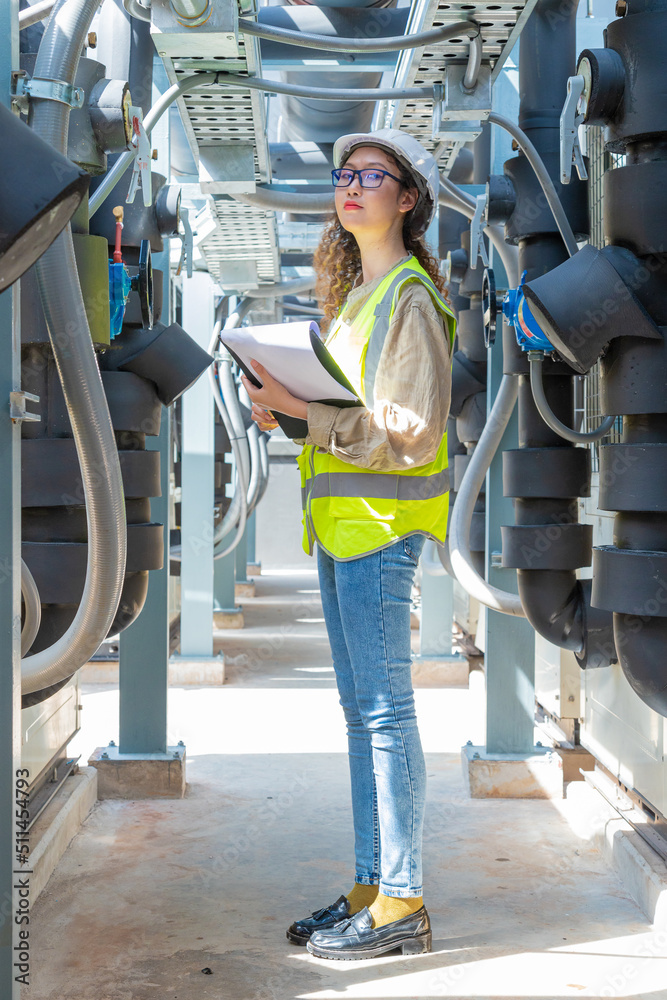 Engineer under checking the industry chilled water fan coil unit air ...