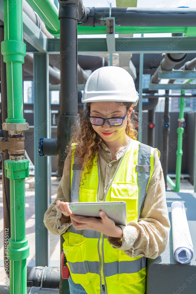 Engineer under checking the industry chilled water fan coil unit air ...