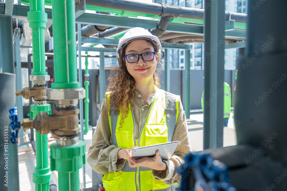 Engineer under checking the industry chilled water fan coil unit air ...