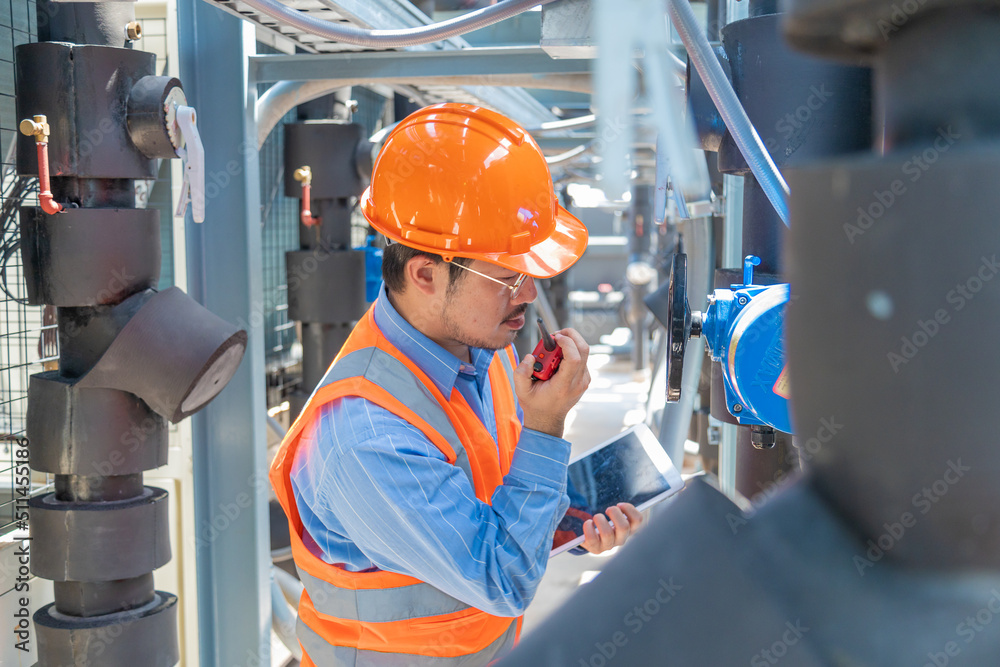 Engineer under checking the industry chilled water fan coil unit air ...